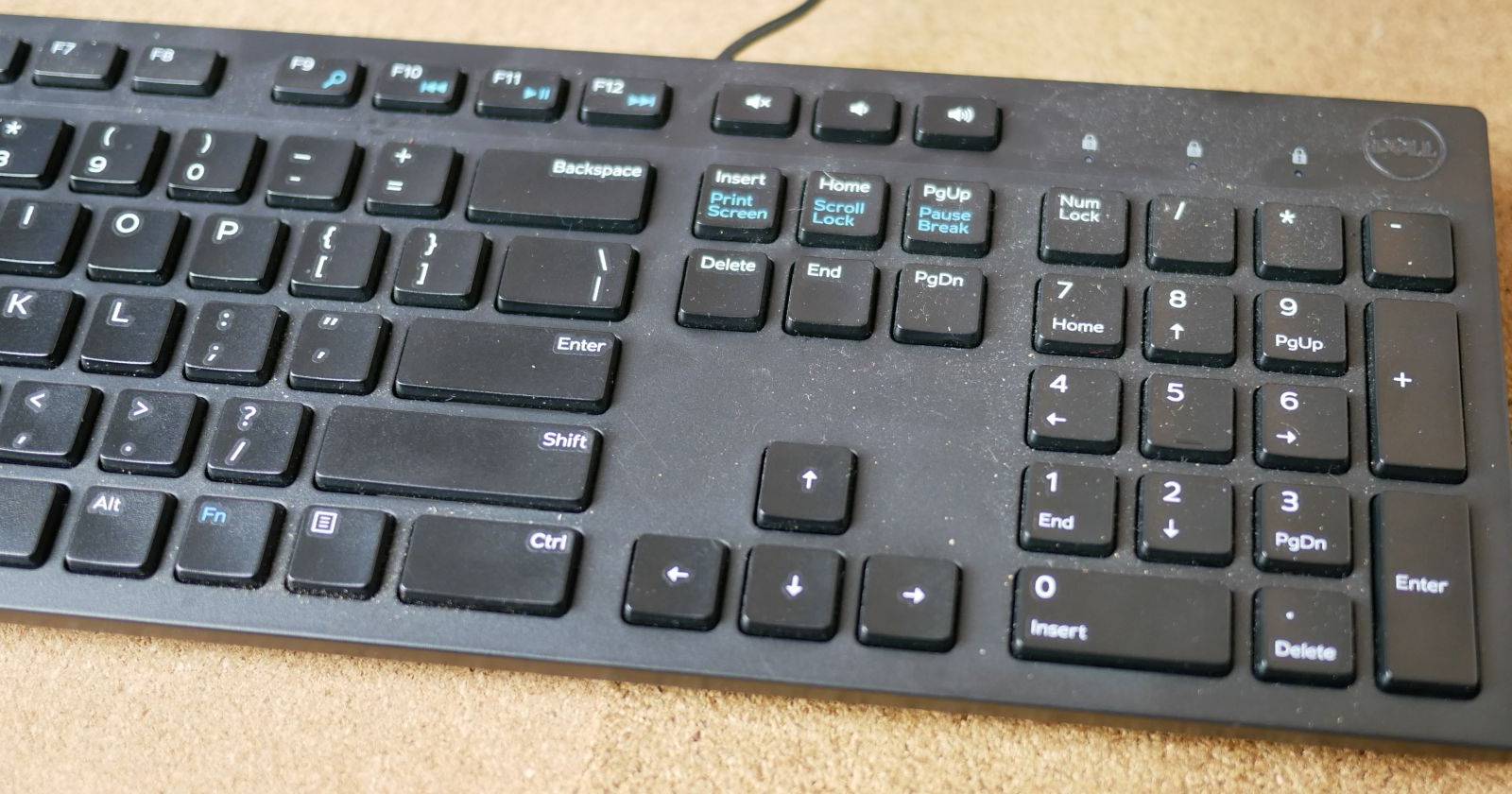 A Simple Trick for Cleaning Under Your Keyboard's Keys