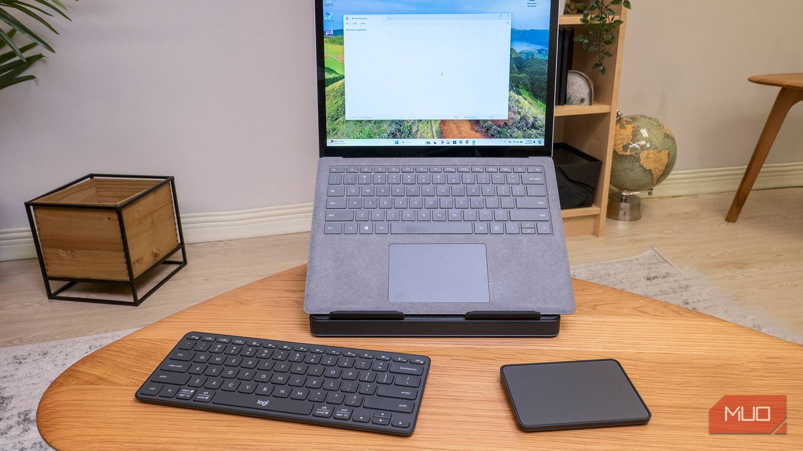Logitech Casa Pop-Up Desk Review: A Keyboard, Trackpad, and Laptop ...